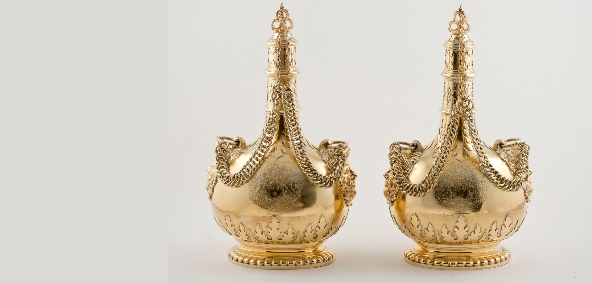 A pair of Dutch silver-gilt pilgrim bottles